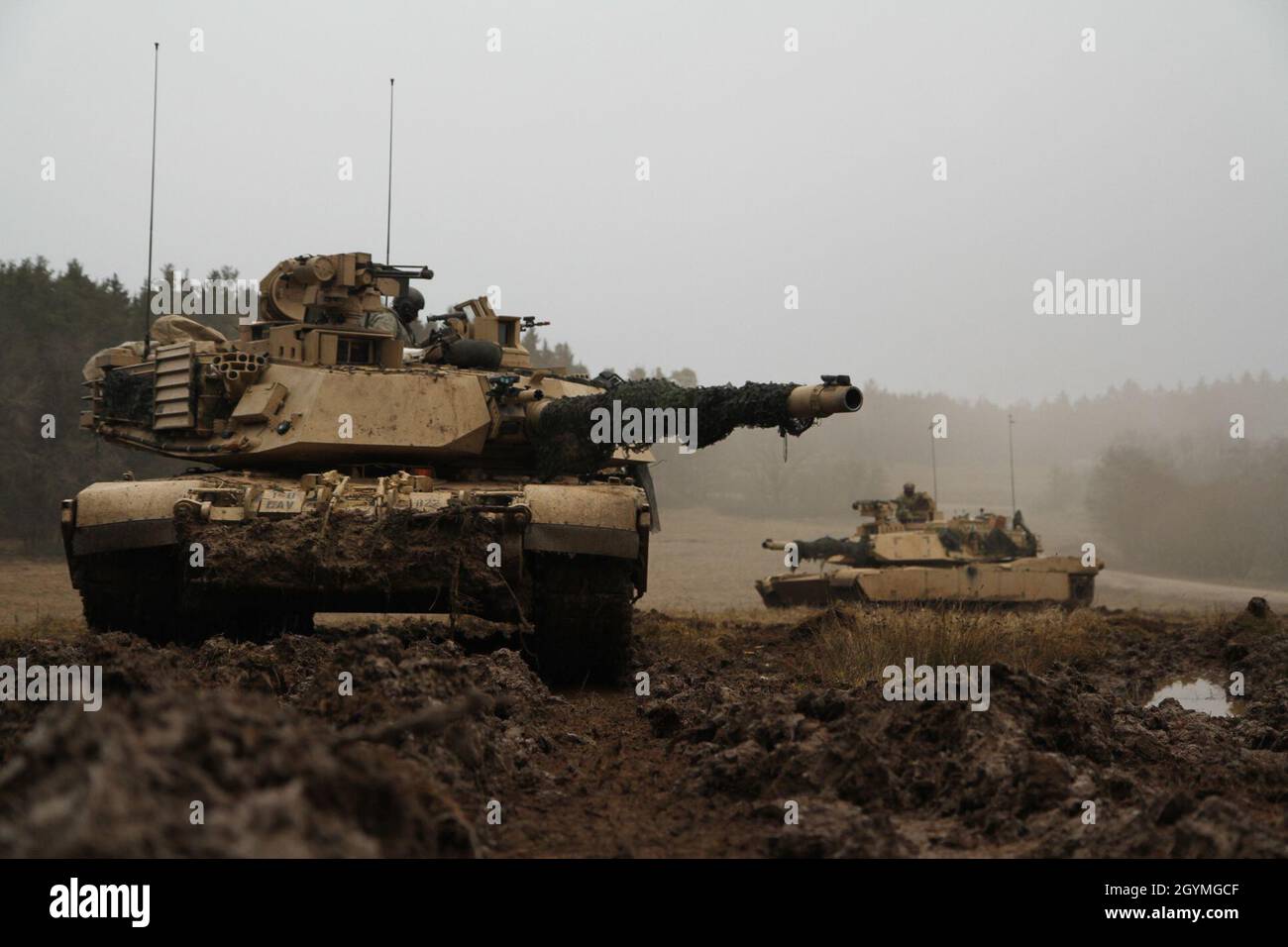 Tanks from 1st battalion, 8th Cavalry Regiment pull security during ...