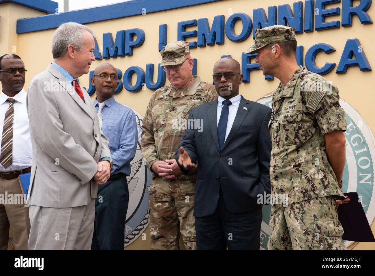 U.S. Navy Capt. Ken Crowe (right), commanding officer of Camp Lemonnier ...