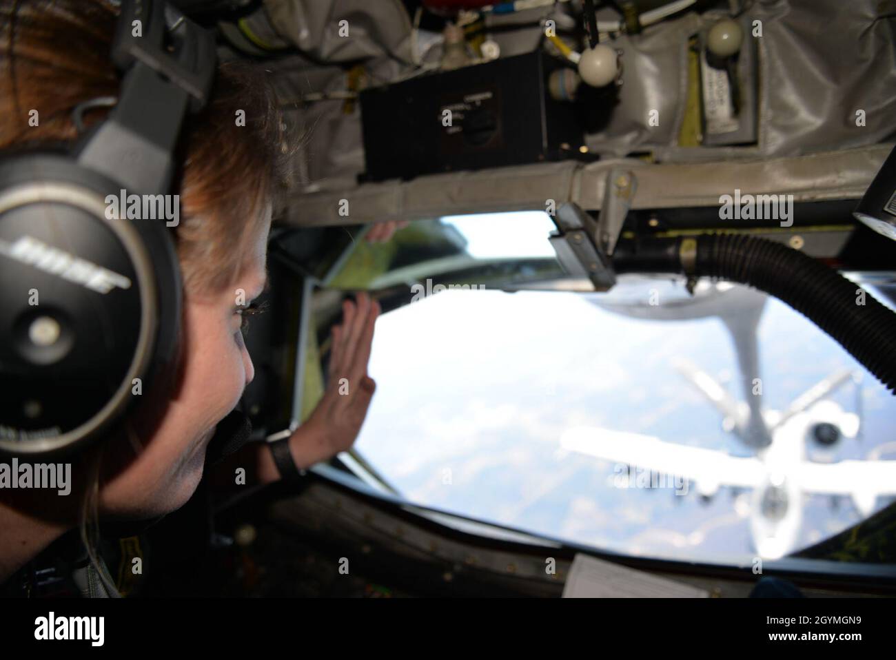 MSgt. Nikki Rawson waves goodbye to the pilot of an A-10 Thunderbolt II ...