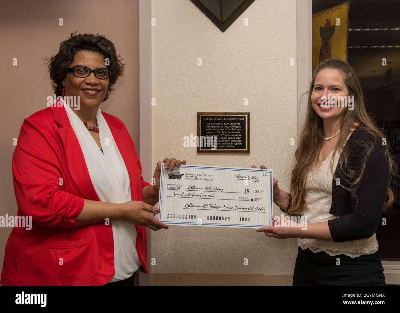 Carolyn Peeler, (left) Holloman AFB Tuskegee Airmen Chapter president ...