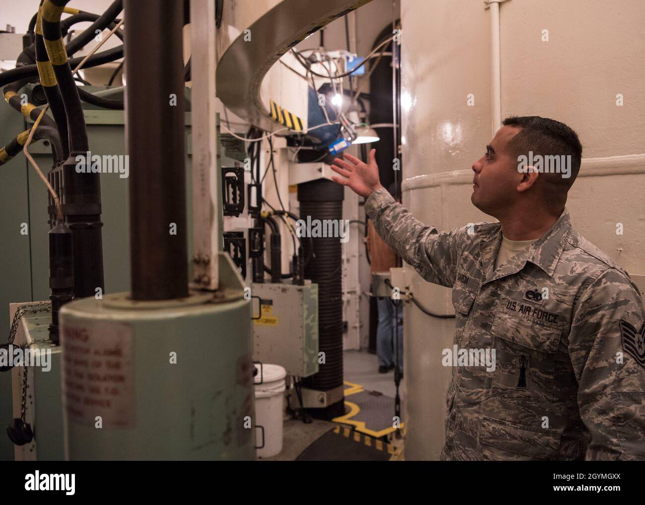 An Airman from the 576th Flight Test Squadron educates members of the ...