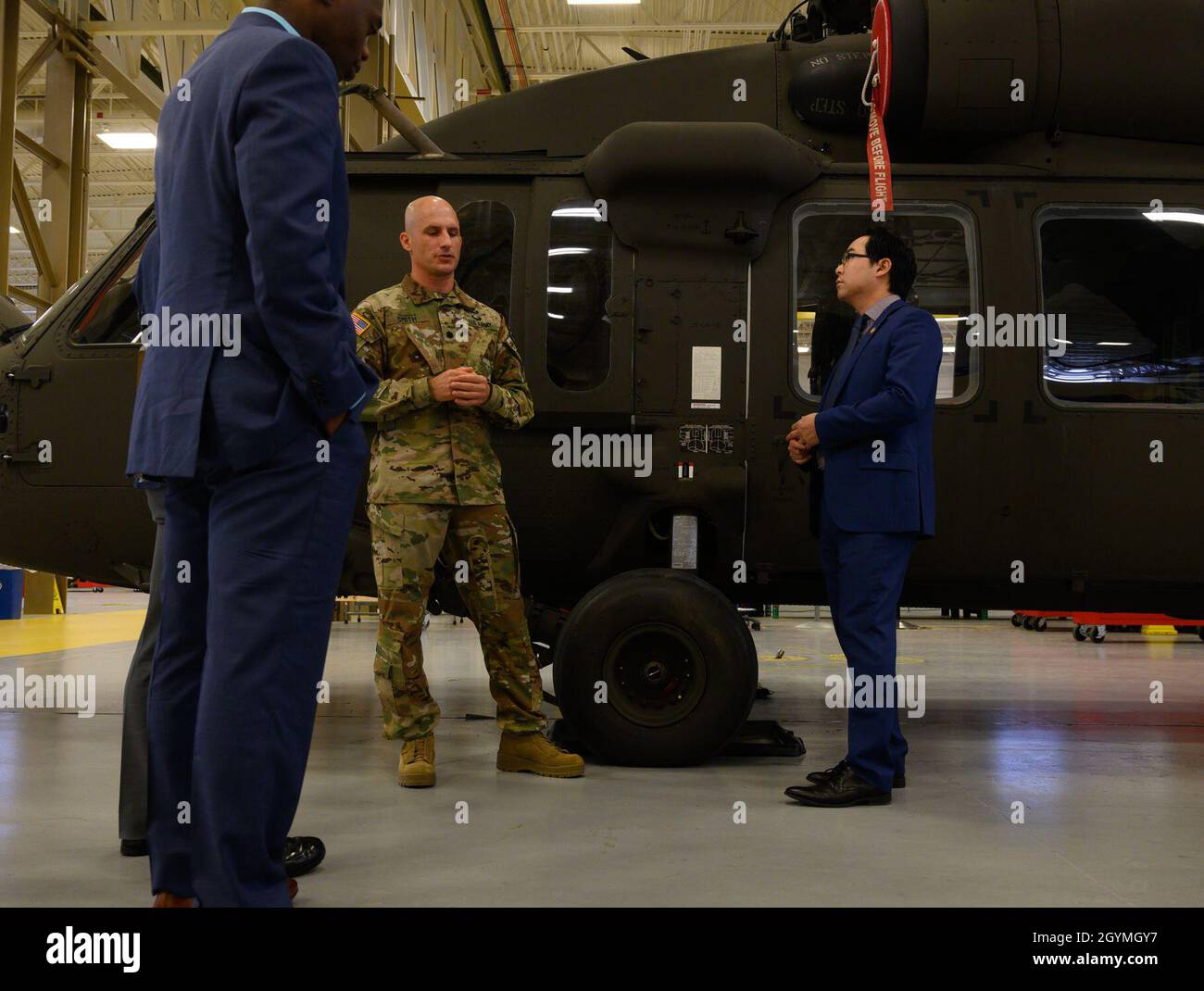 U.S. Army Lt. Col. Ryan Smith takes Representative Andy Kim on a tour ...