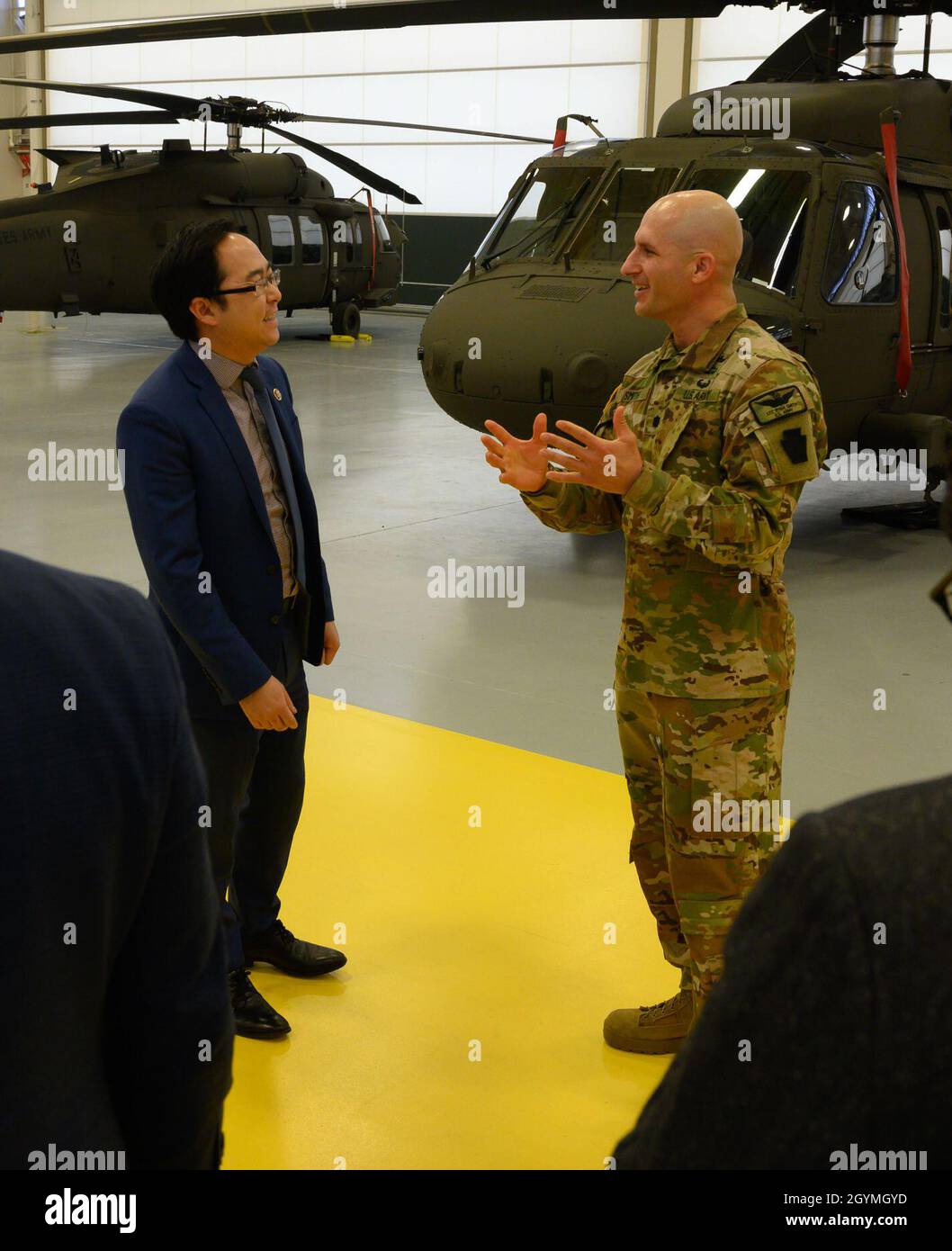 U.S. Army Lt. Col. Ryan Smith takes Representative Andy Kim on a tour ...