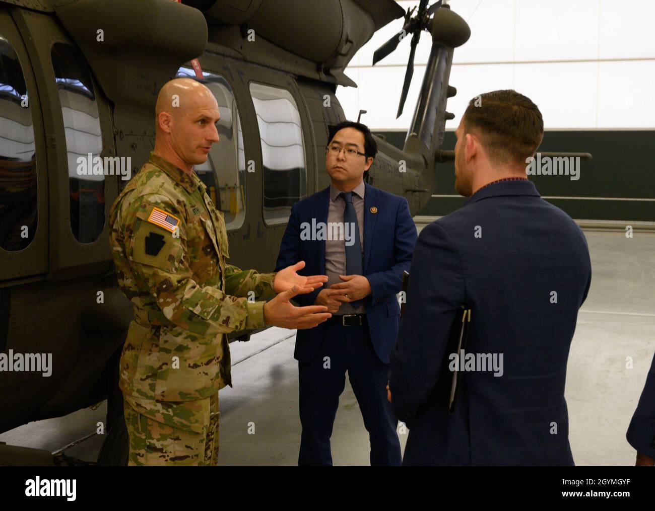 U.S. Army Lt. Col. Ryan Smith takes Representative Andy Kim on a tour ...