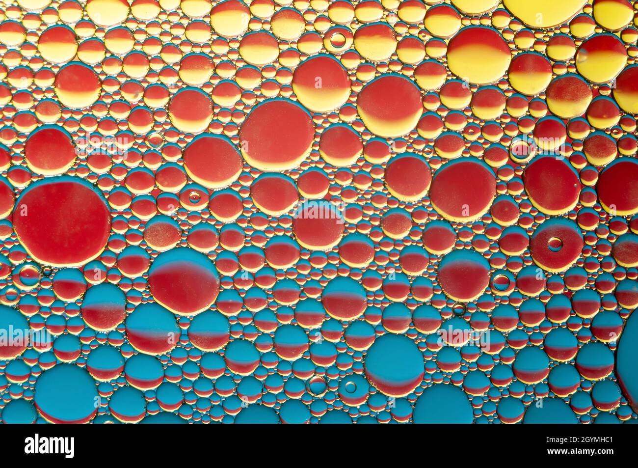 Abstract background and texture of oil drops on water with different ...