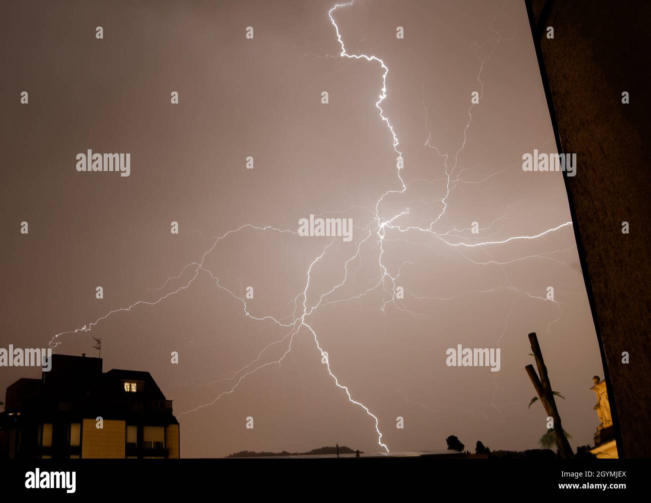 Danger with storms in cities. Electrical storm with a lightning in the ...