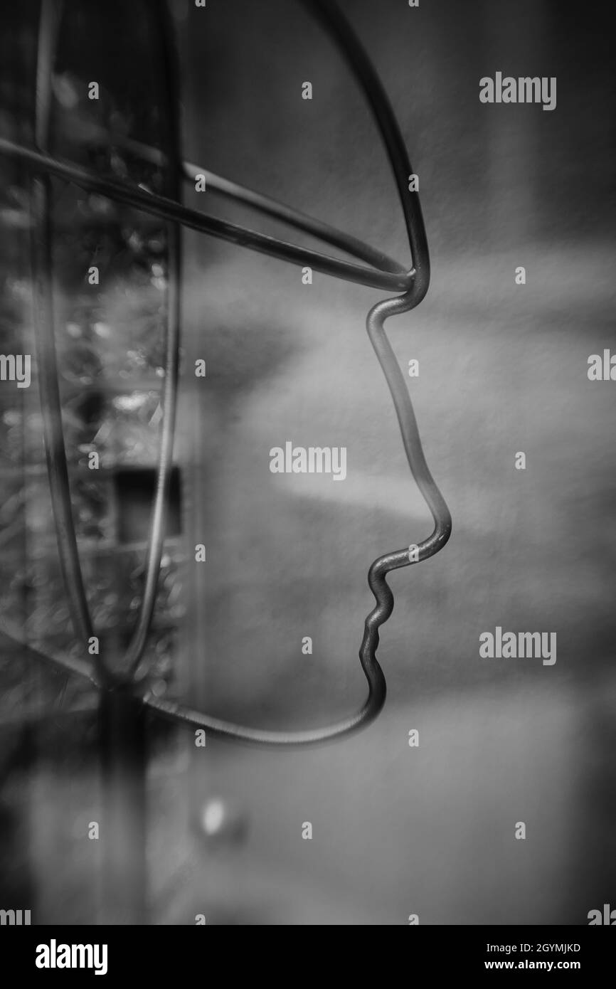 Layers of images seen through the glass with reflections on the surface ...