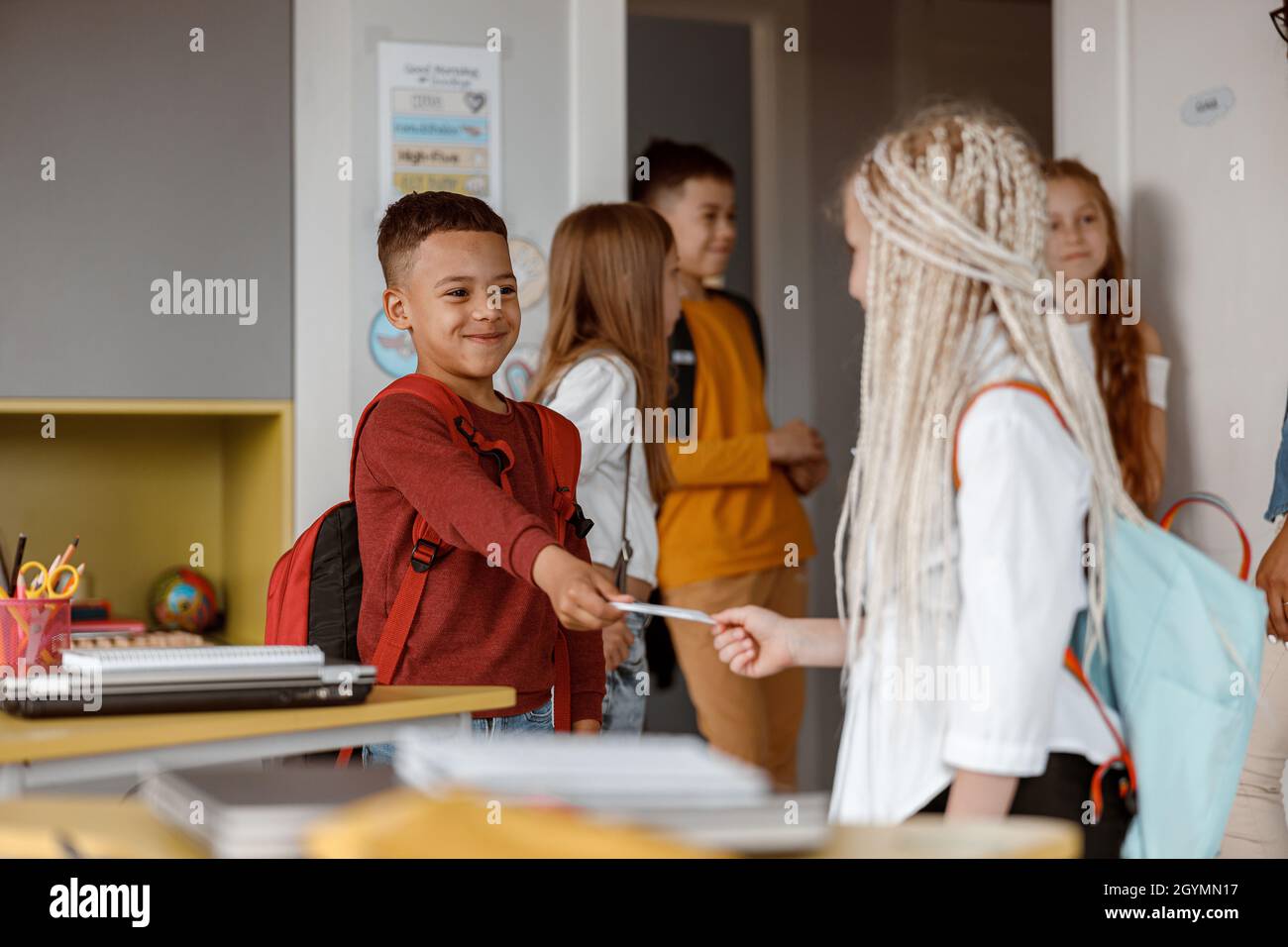 Backpacks classroom table hi-res stock photography and images - Alamy