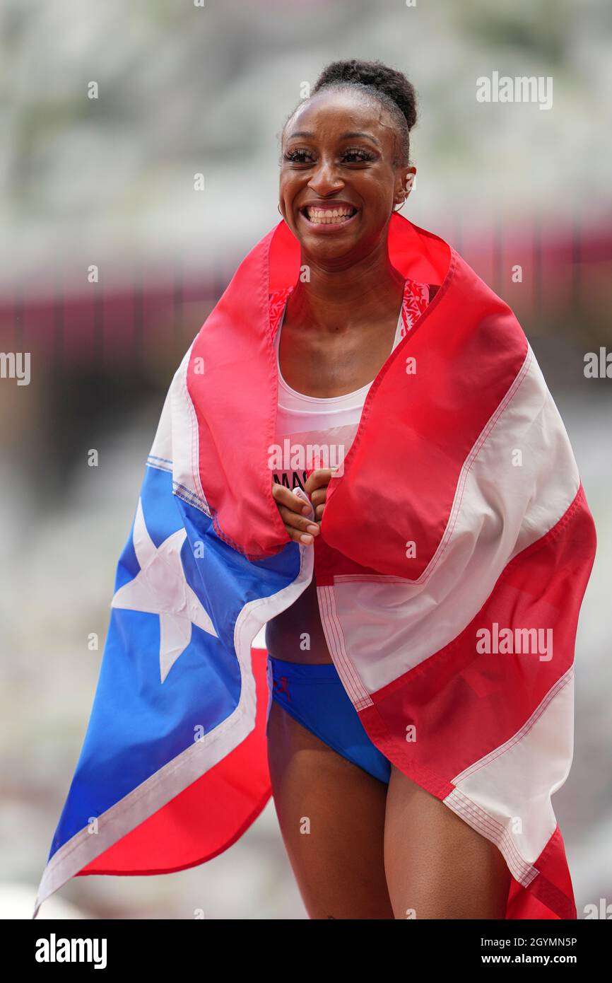 Jasmine Camacho-Quinn with her country's flag after winning gold at the ...