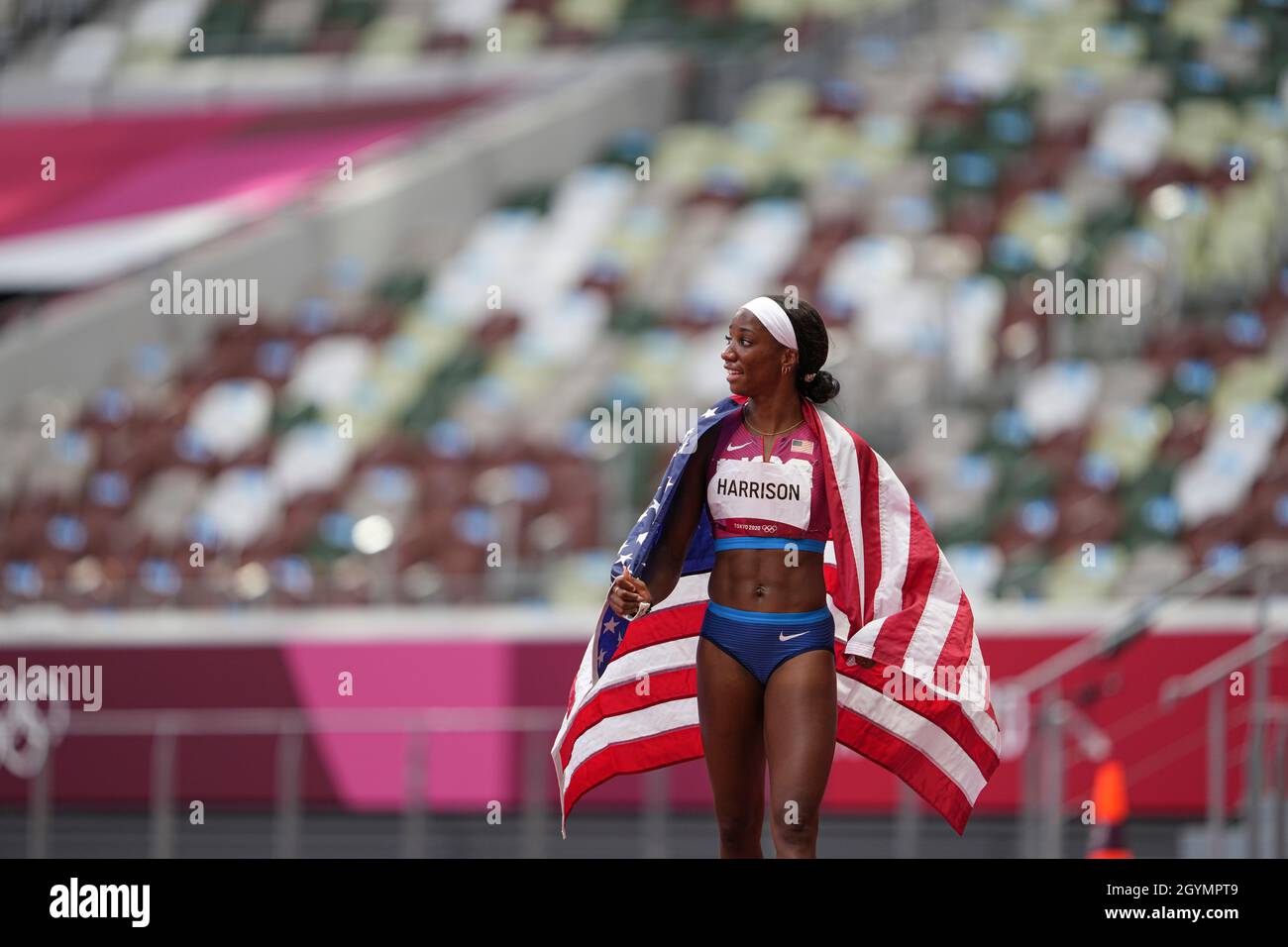 Keni Harrison with her country's flag after winning the silver medal at ...