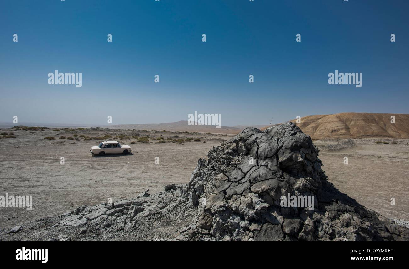 the mud volcanoes of gobustan with a Lada, Azerbaijan Stock Photo - Alamy