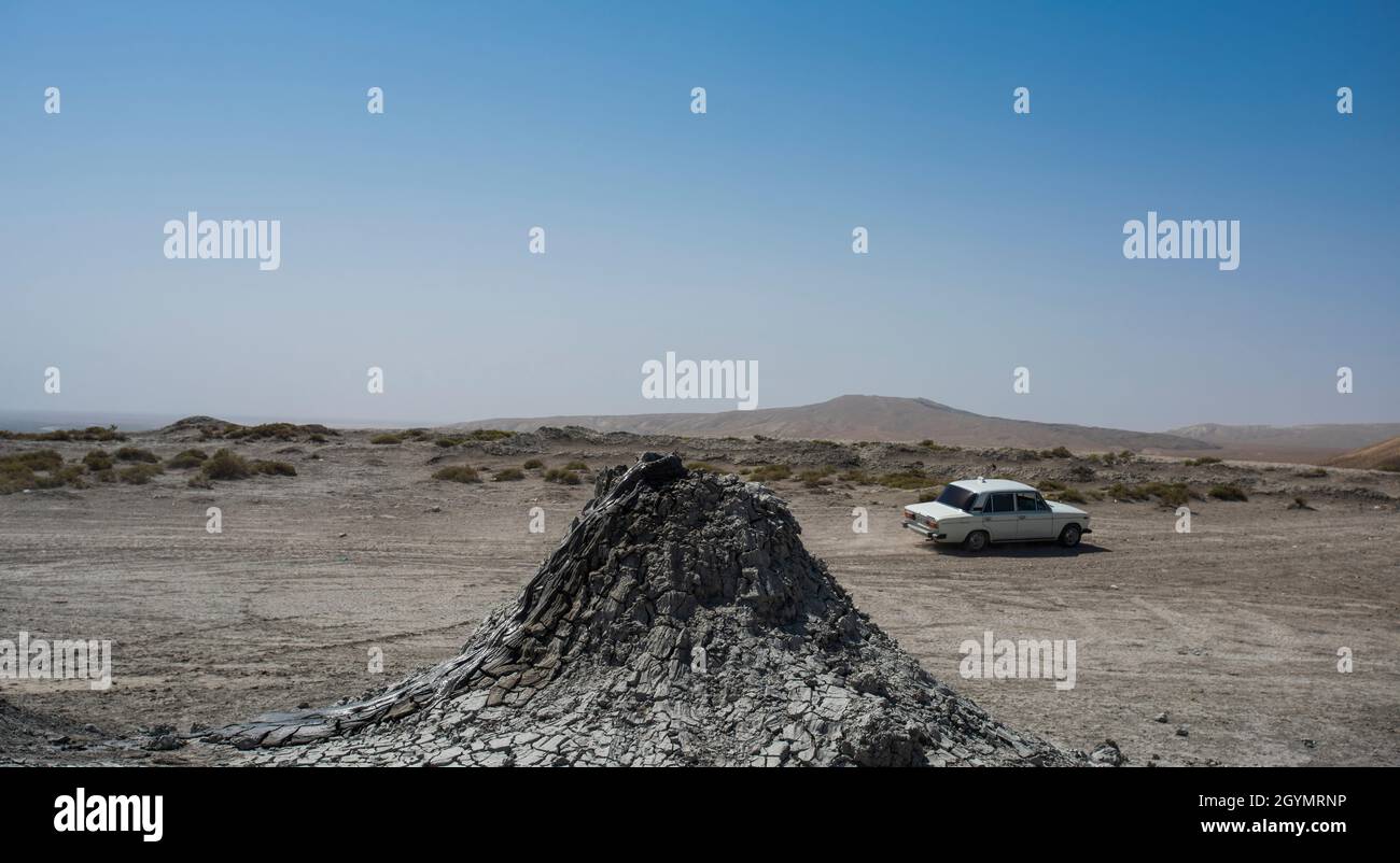 the mud volcanoes of gobustan with a Lada, Azerbaijan Stock Photo - Alamy