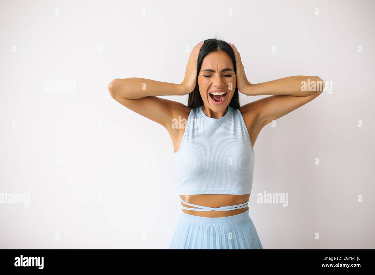 Woman hands over ears home hi-res stock photography and images - Alamy