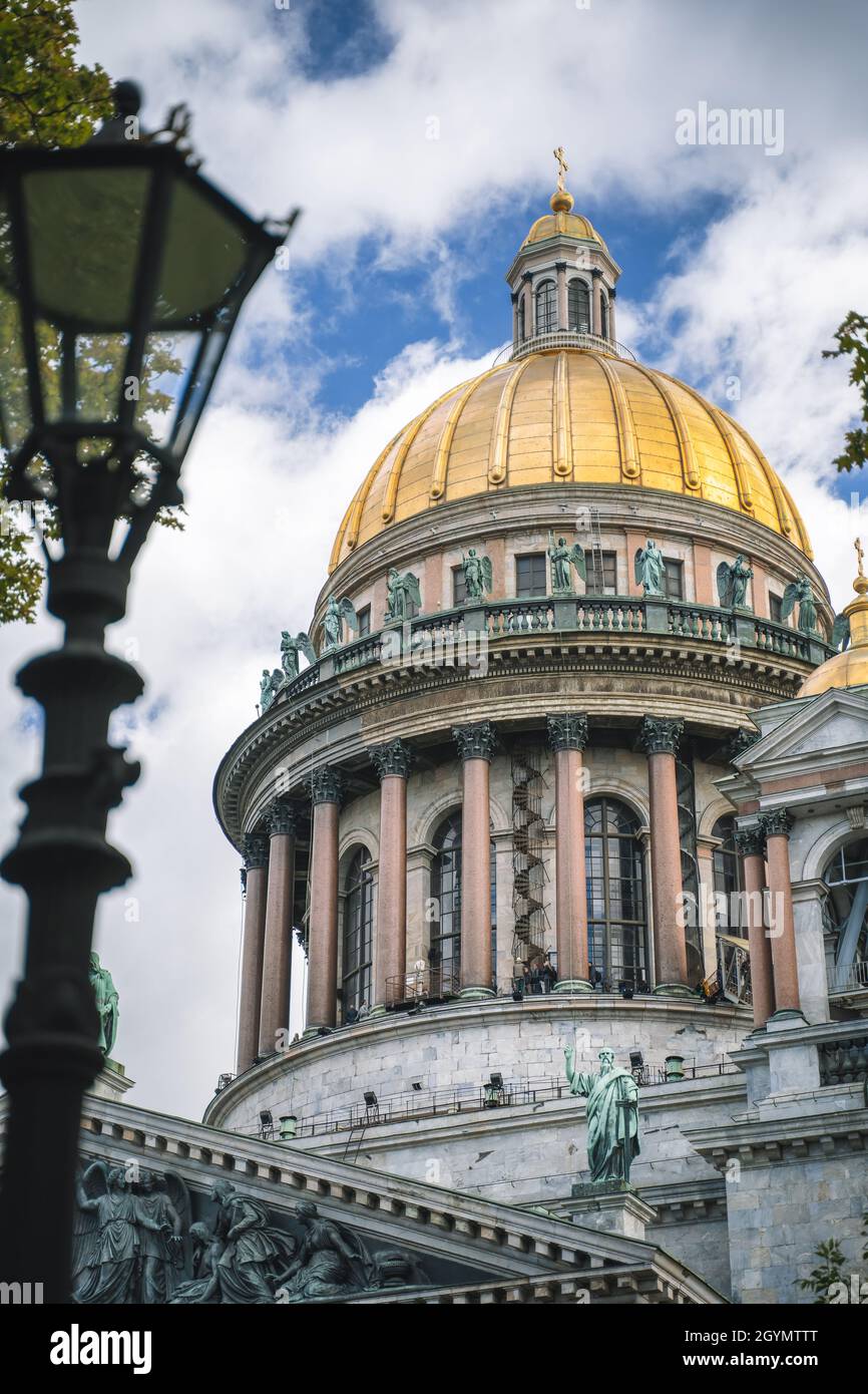 Saint Isaac's Cathedral colonnade with golden dome close up view in ...