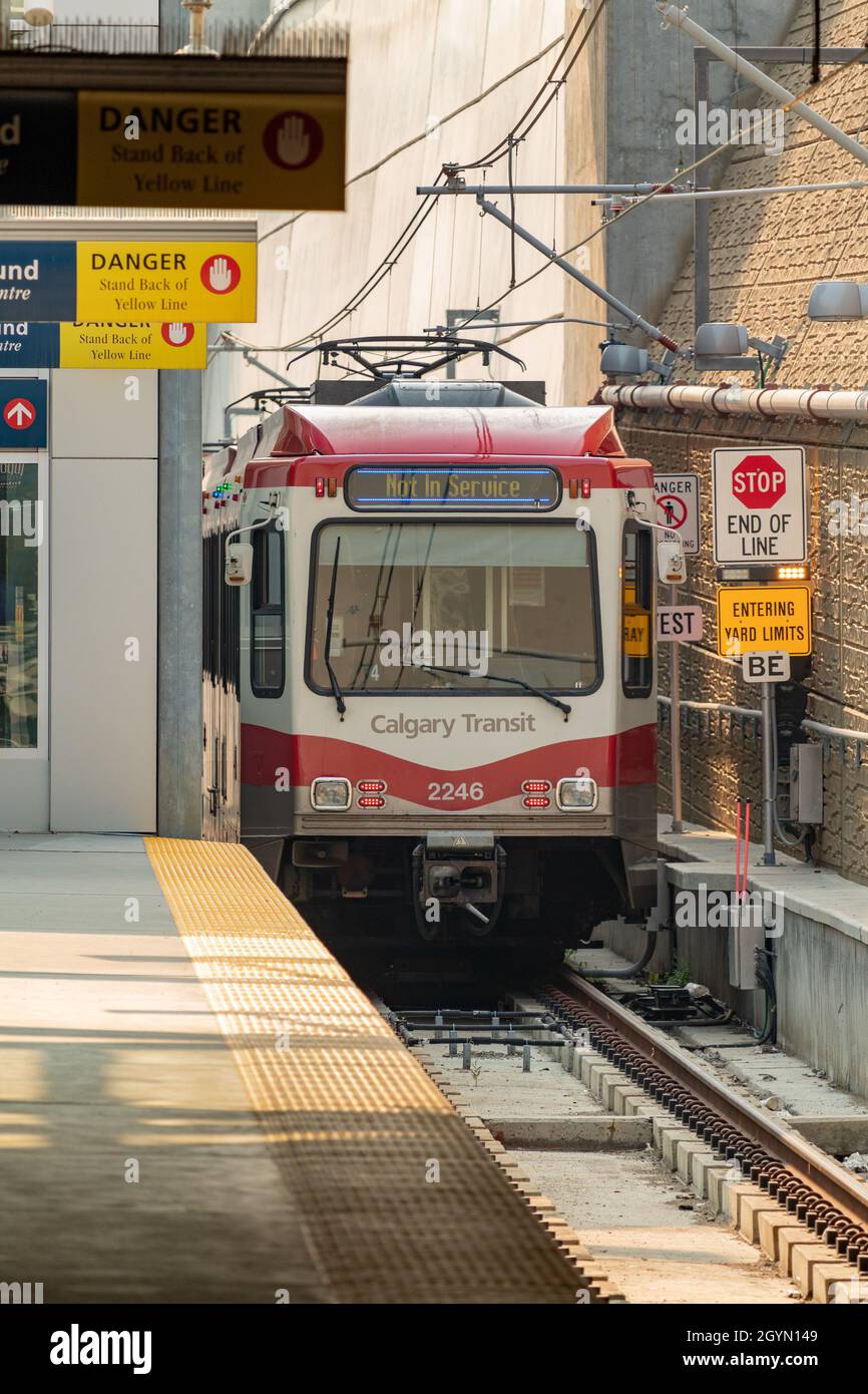 July 30, 2021 - Calgary Transit CTrain departing 69 Street SW Station ...
