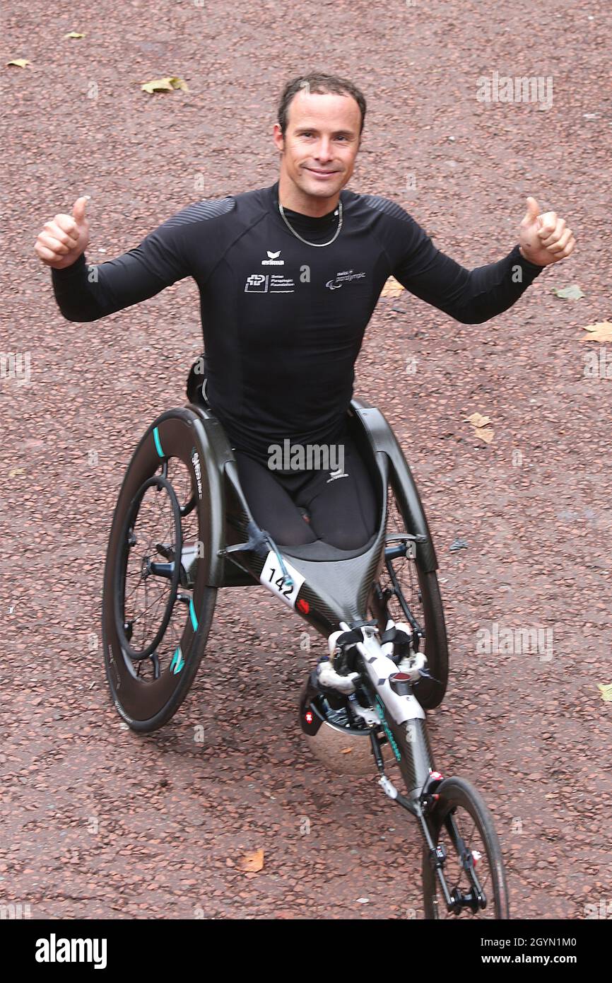 Marcel Hug of Switzerland celebrates after winning the 2021 Virgin ...