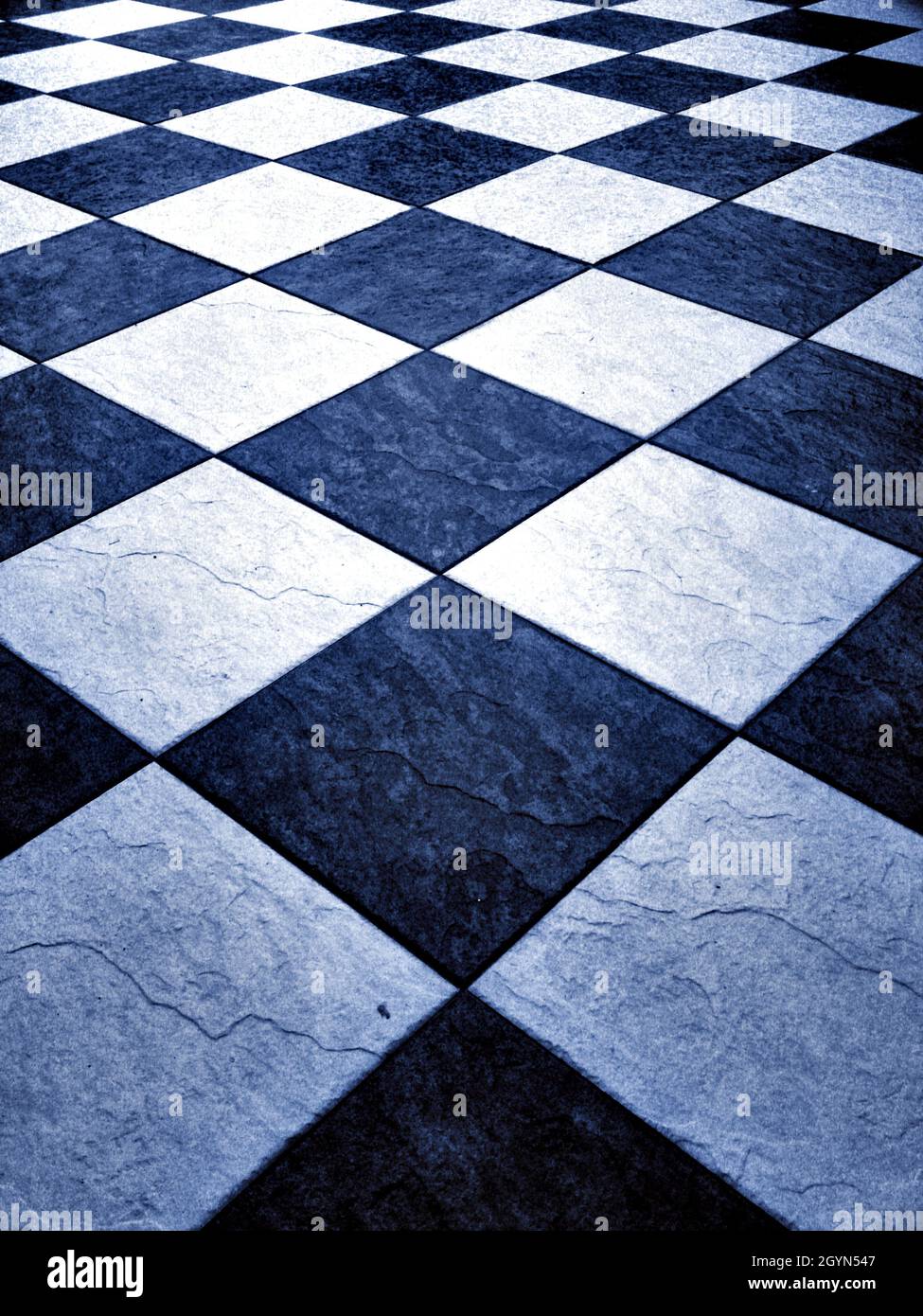 Image view of a blue and white checkered pavement Stock Photo - Alamy