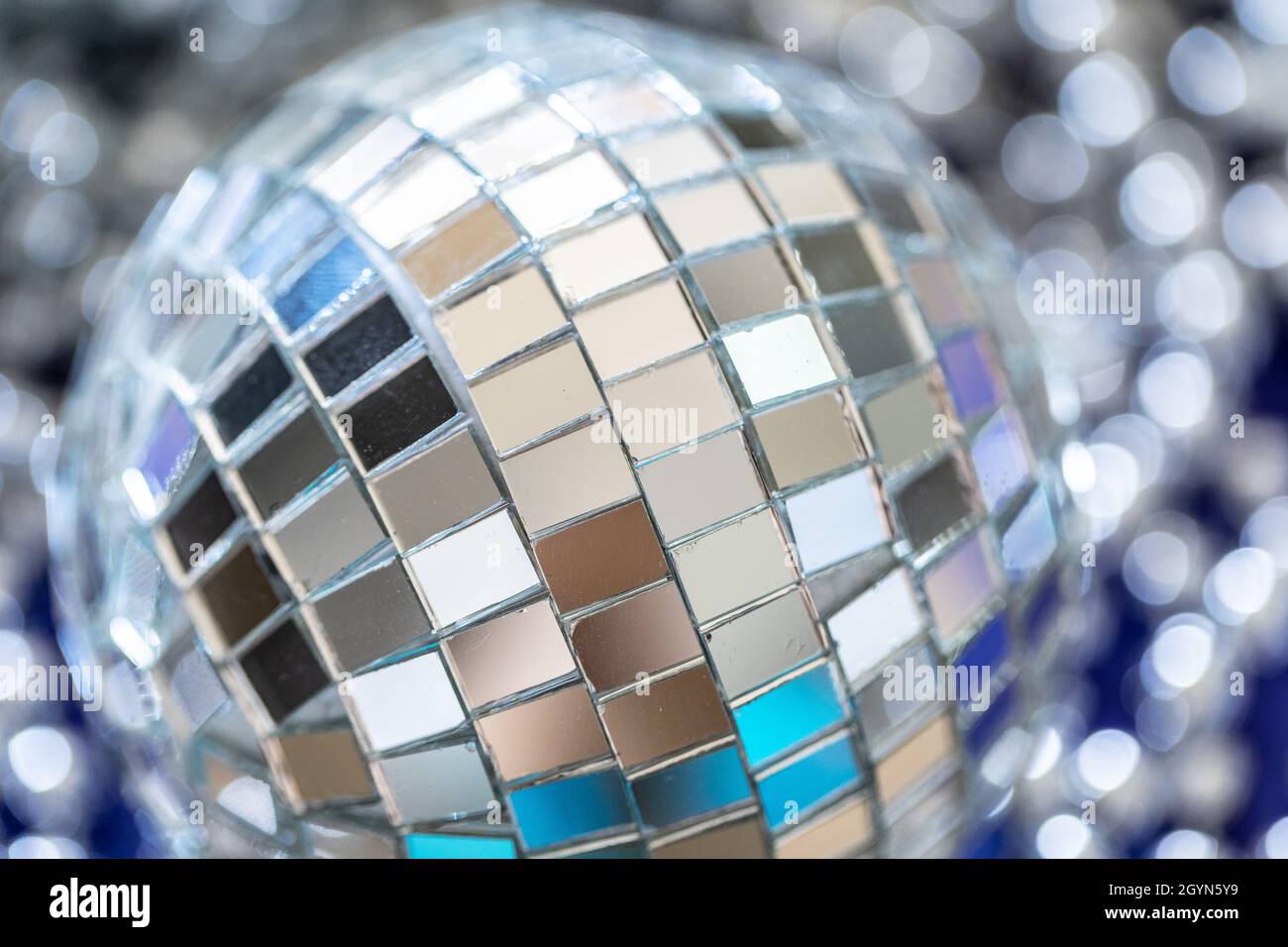 Sparkling disco ball in a day light. Concept of party Stock Photo - Alamy