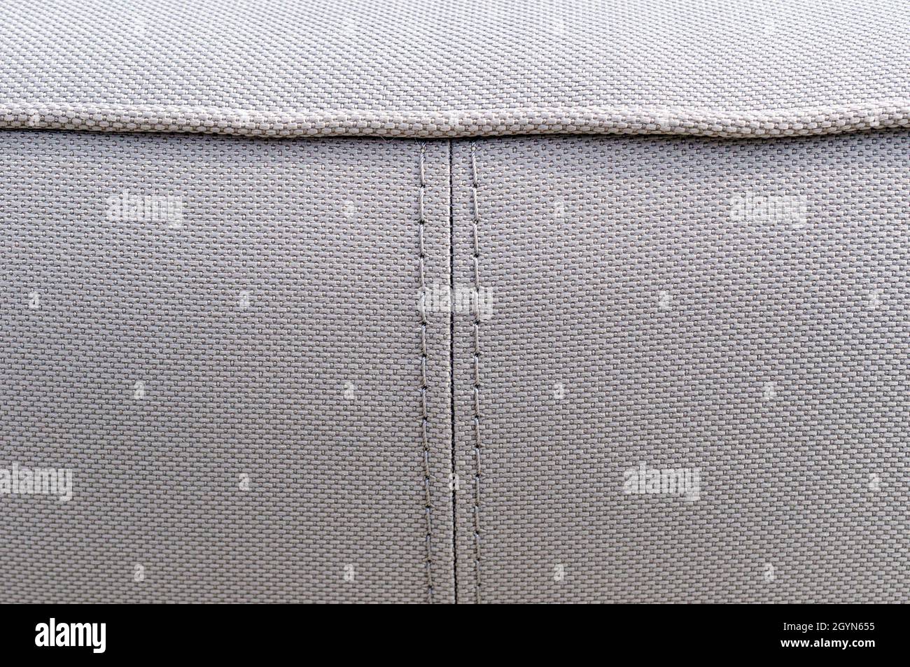 new sewn upholstery for sofa made of strong fabric and strong seams ...