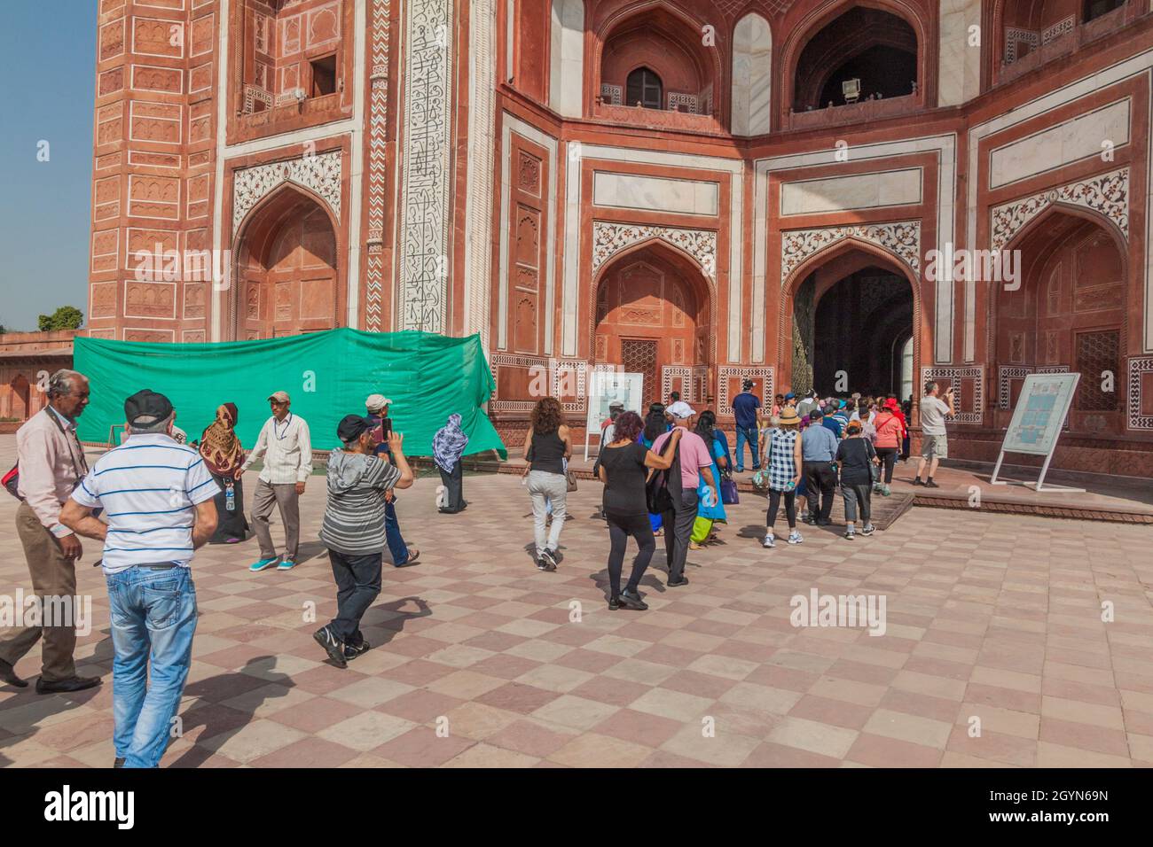 AGRA, INDIA - FEBRUARY 19, 2017: Tourists visit Taj Mahal complex in ...