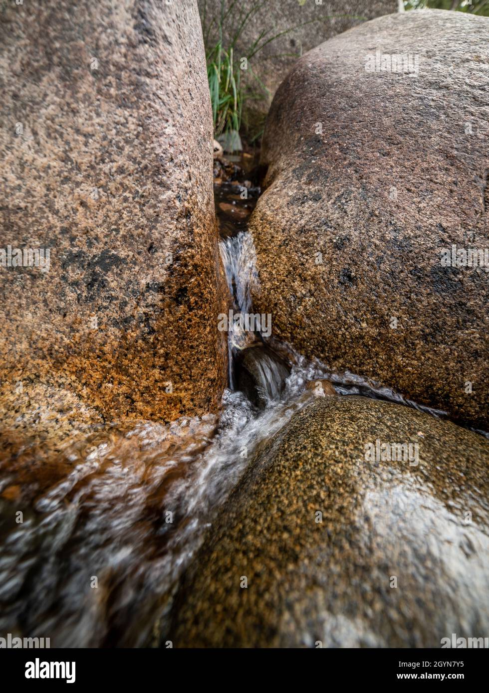 Water of the river flows between large stones Stock Photo - Alamy