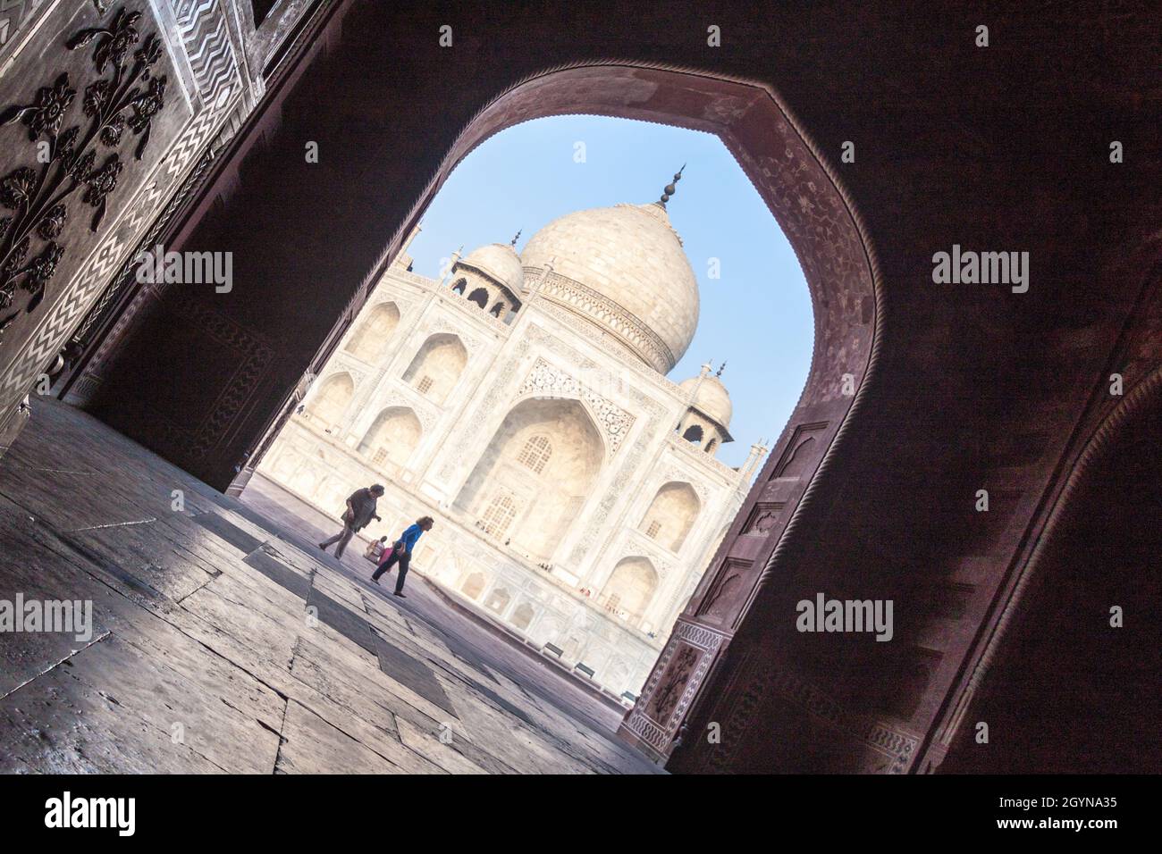 AGRA, INDIA - FEBRUARY 19, 2017: People visit Taj Mahal complex in Agra ...