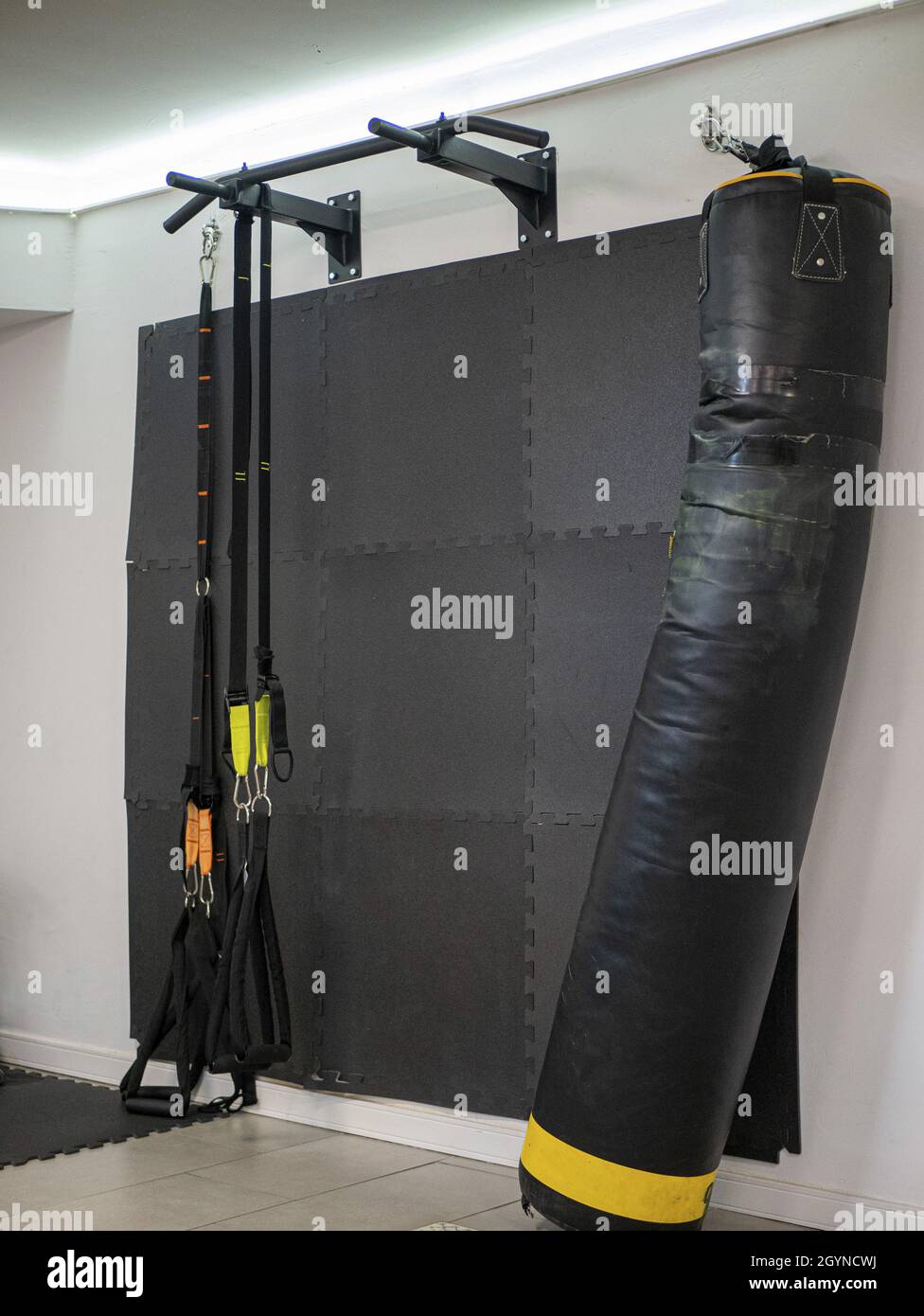 Closeup of a punching bag hanging in the gym Stock Photo - Alamy