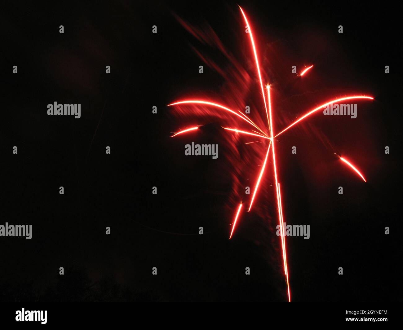 Red firework in the dark sky Stock Photo - Alamy