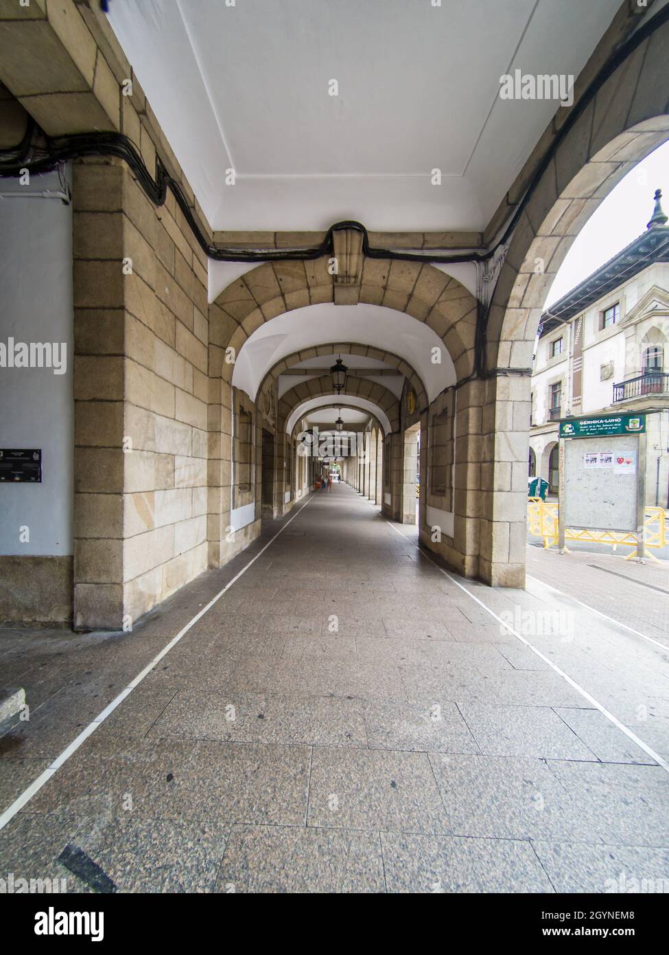 Beautiful modern building entrance with a long street Stock Photo - Alamy