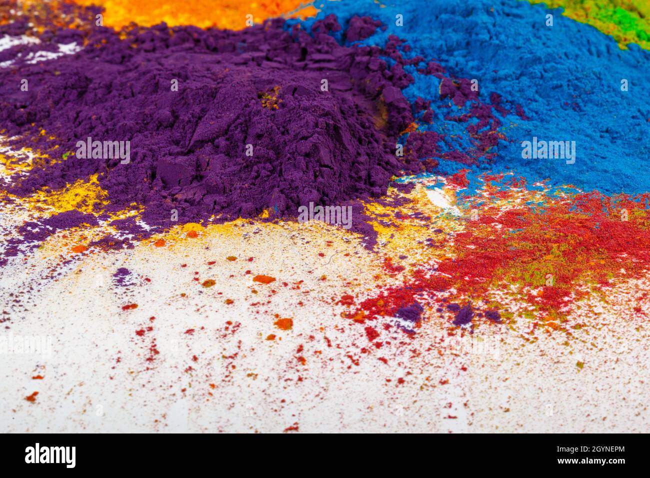 Colorful background made of Indian colorful dyes Stock Photo - Alamy