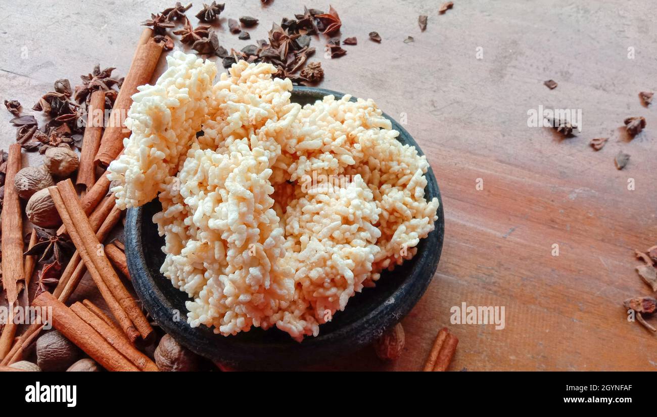 Pile of authentic Indonesian spices such as cinnamon, anise, cumin and ...