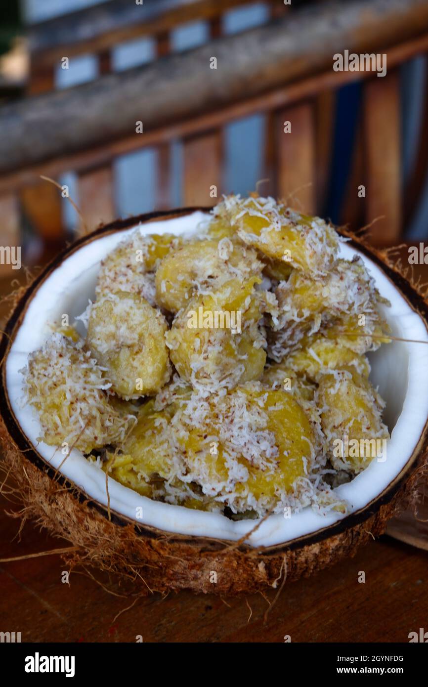 Vertical shot of processed bananas in a coconut Stock Photo - Alamy