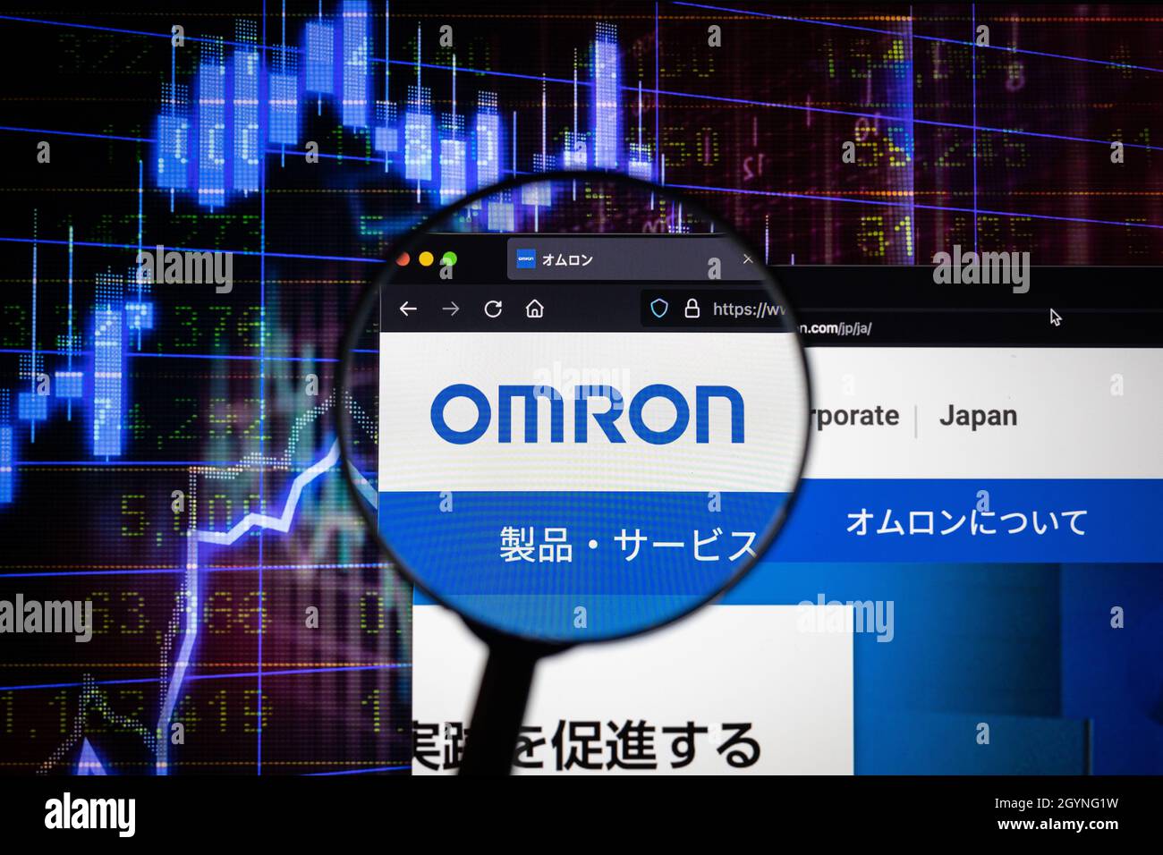 Omron company logo on a website with blurry stock market developments ...