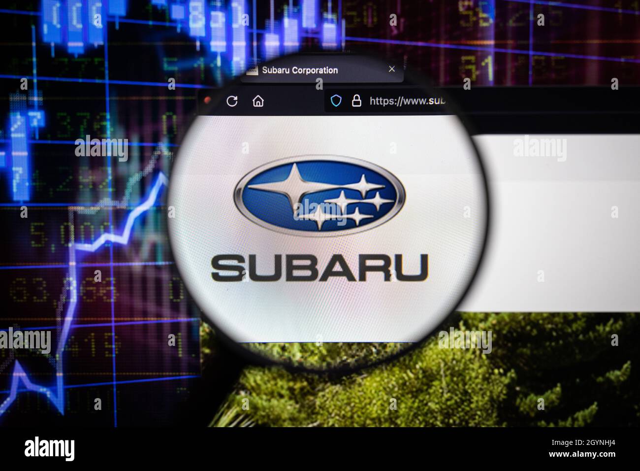 Subaru company logo on a website with blurry stock market developments in the background, seen ...
