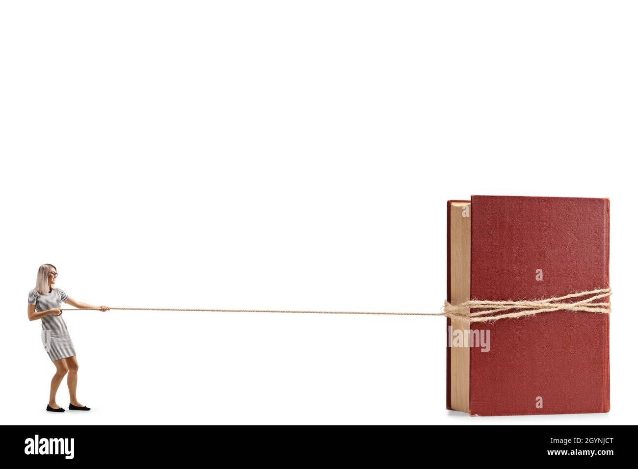 Full length profile shot of a woman in a casual dress pulling a book ...