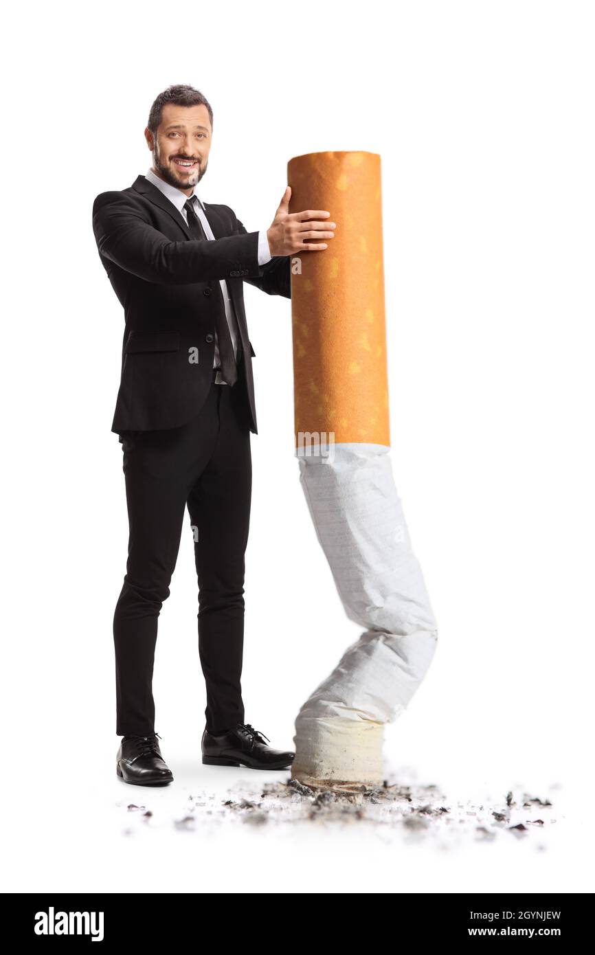 Full length portrait of a businessman putting off a big cigarette ...