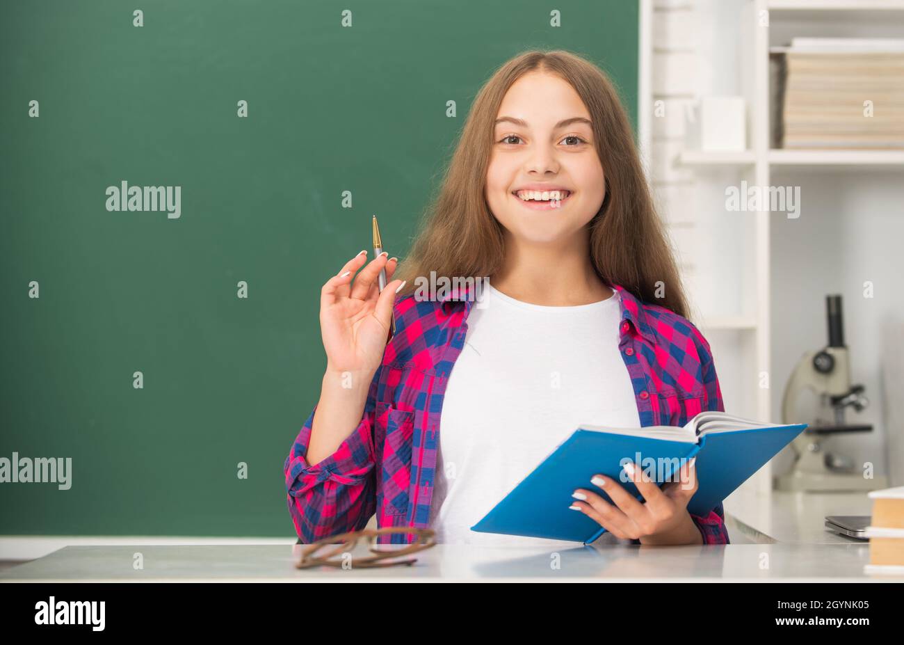 back to school. teen girl ready to study. kid do homework with book ...
