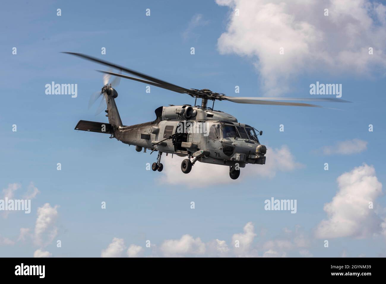 211003-N-WS494-1111 PHILIPPINE SEA (Oct. 3, 2021) An MH-60R Seahawk ...