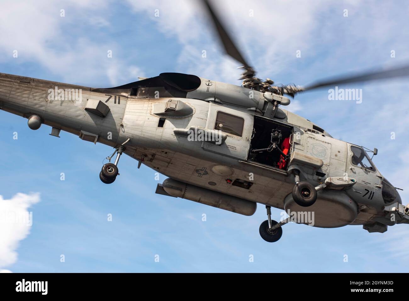 211003-N-WS494-1114 PHILIPPINE SEA (Oct. 3, 2021) An MH-60R Seahawk ...