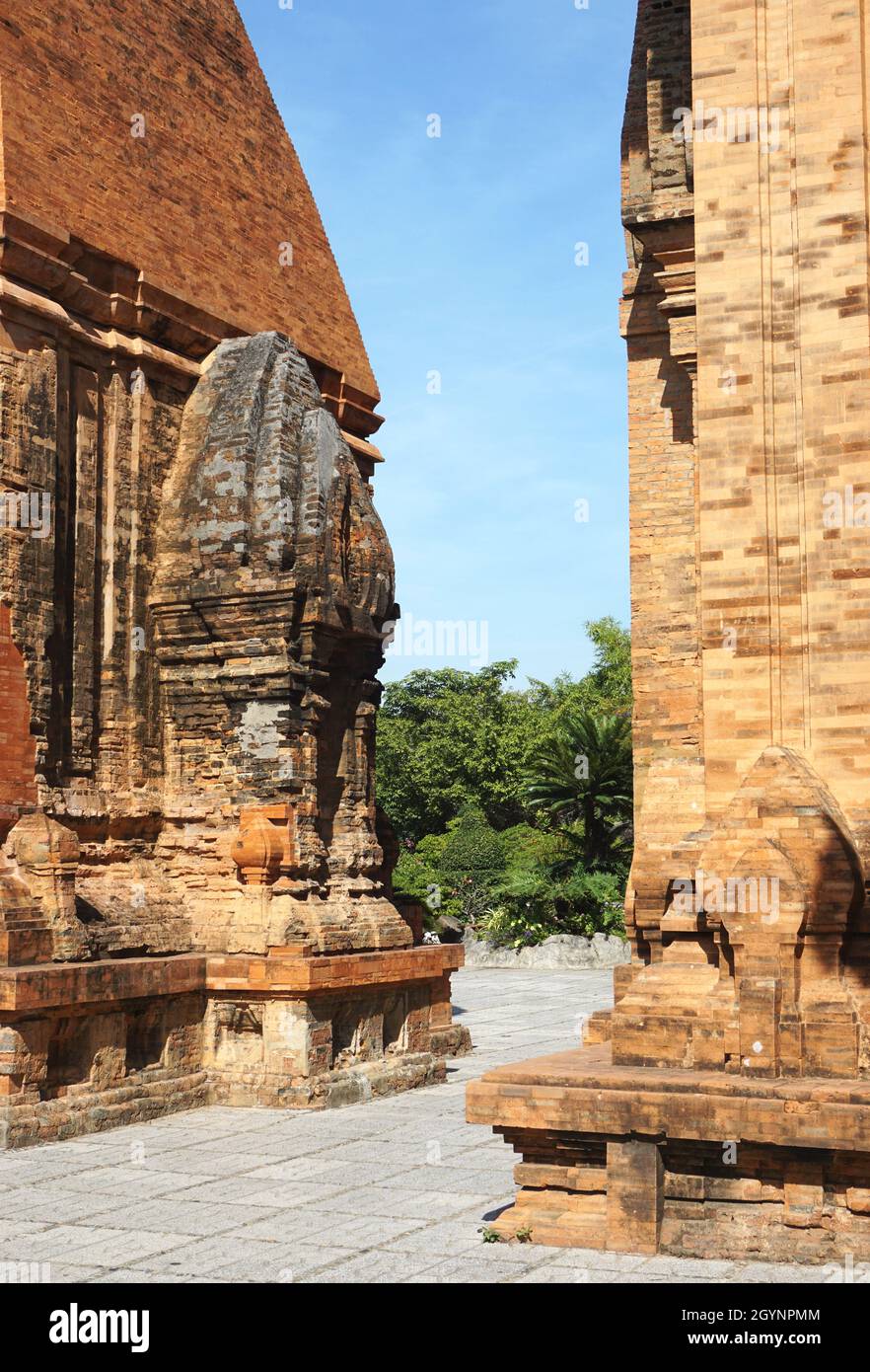 A view between restored remnants of the ancient Po Nagar Cham Towers ...