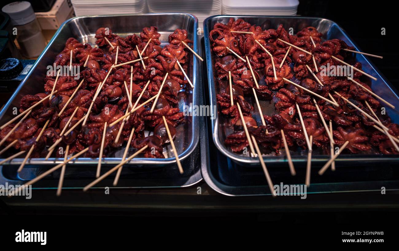 Red octopus with the head stuffed with egg is a local japanese street ...