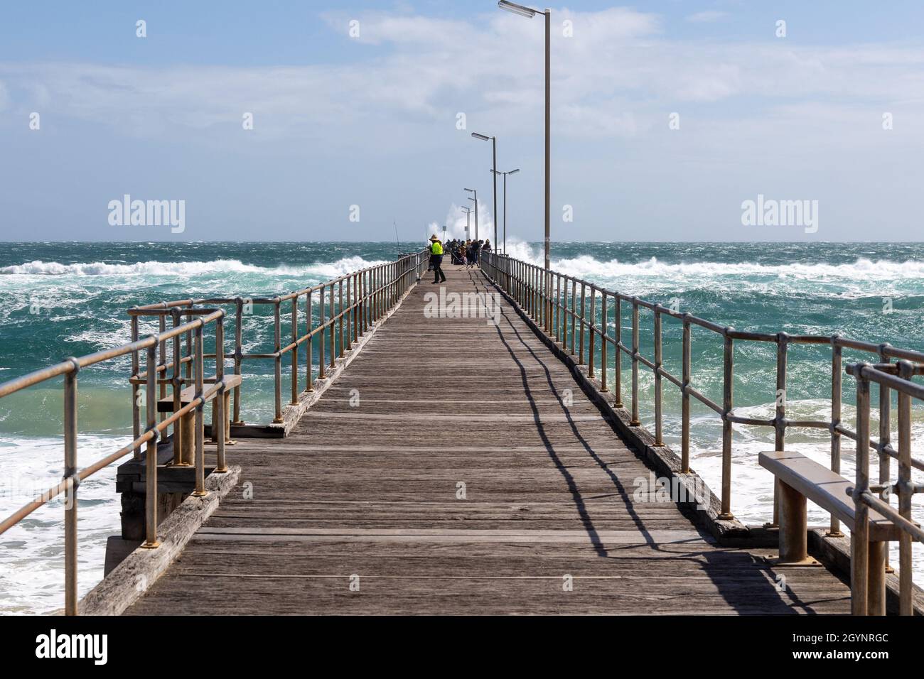 Looking along the port noarlunga jetty with rough swells in south ...