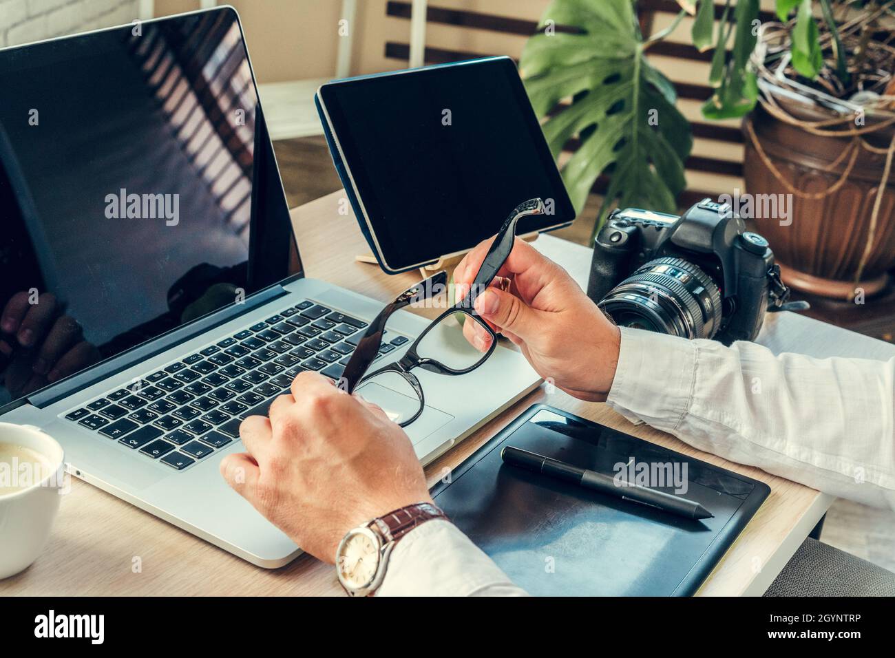 Working table of a photographer close up Stock Photo - Alamy