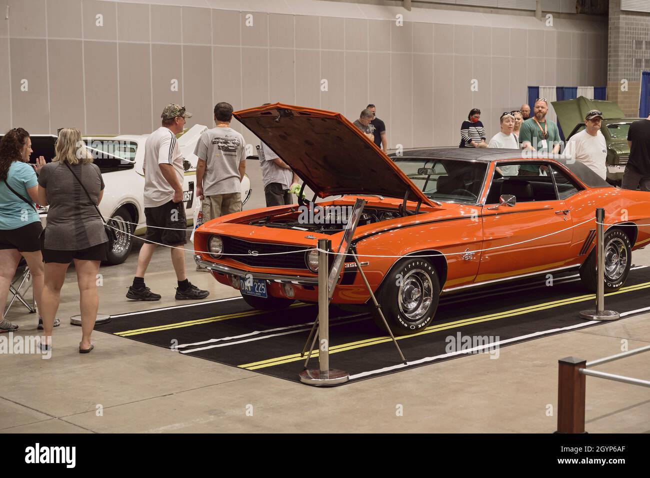 Convention center guests view custom automobiles at the 2021 Ocean City ...
