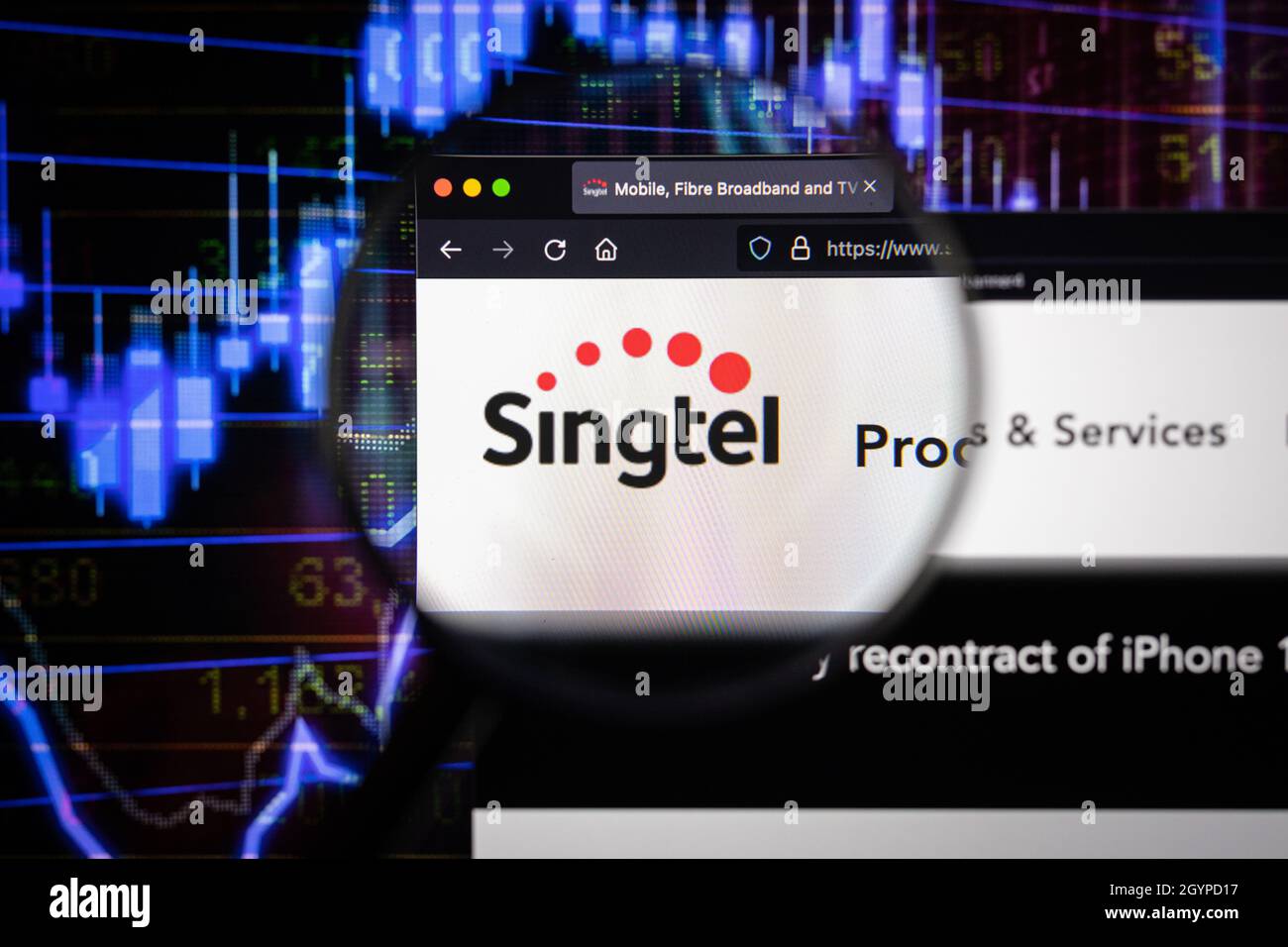 Singtel company logo on a website with blurry stock market developments ...