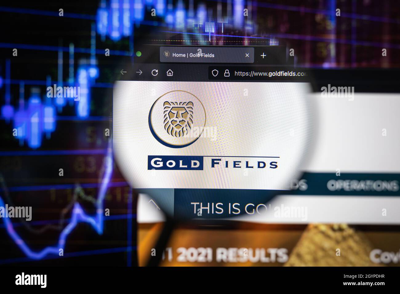 Gold Fields company logo on a website with blurry stock market ...