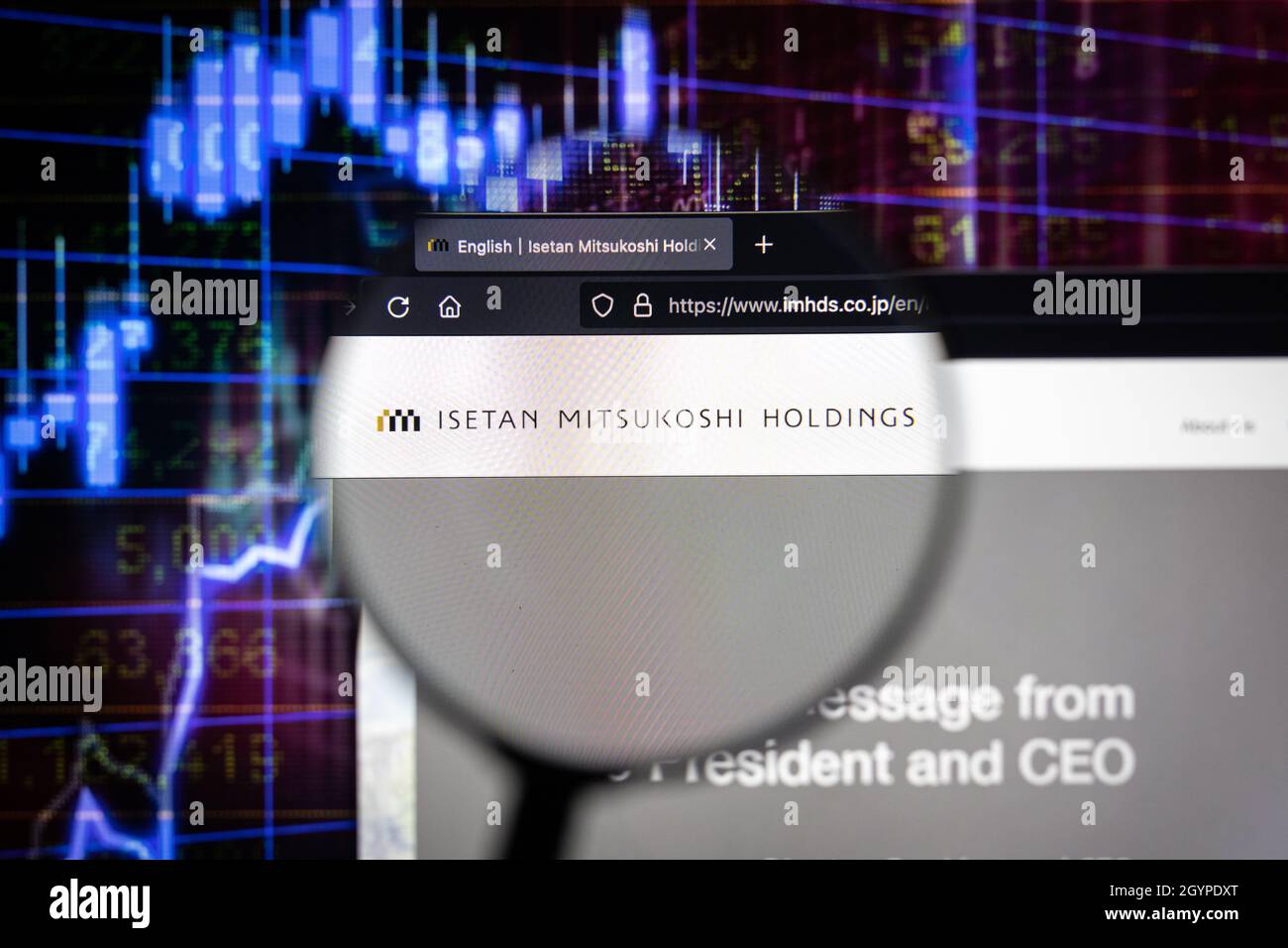 Isetan Mitsukoshi Holdings Ltd. company logo on a website with blurry ...