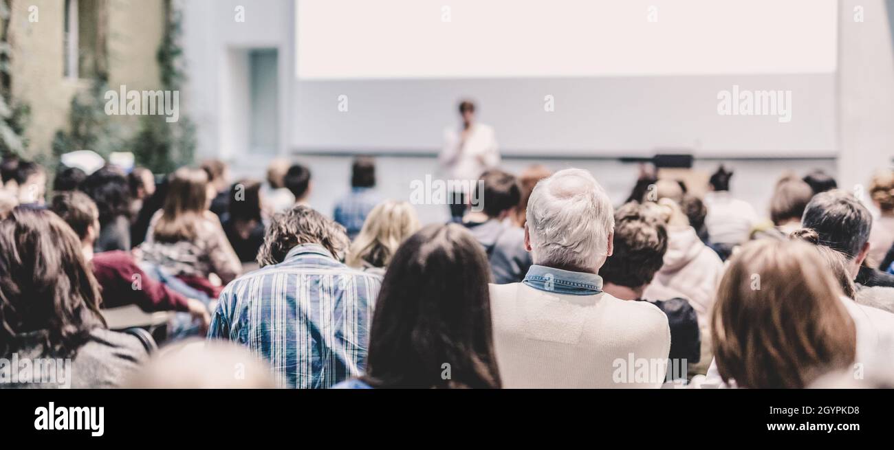 Woman giving academic presentation hi-res stock photography and images ...