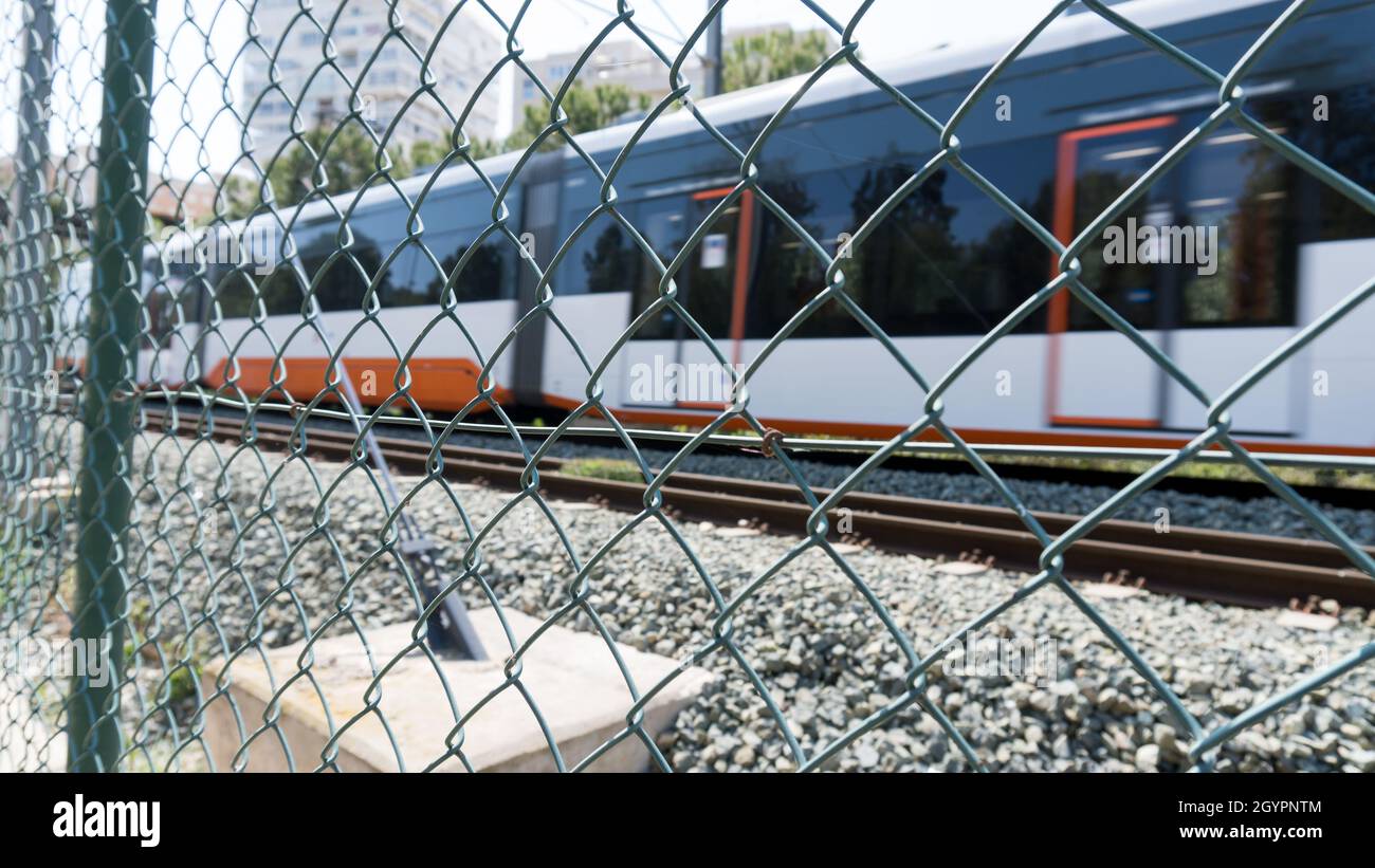 Train behind fence hi-res stock photography and images - Alamy