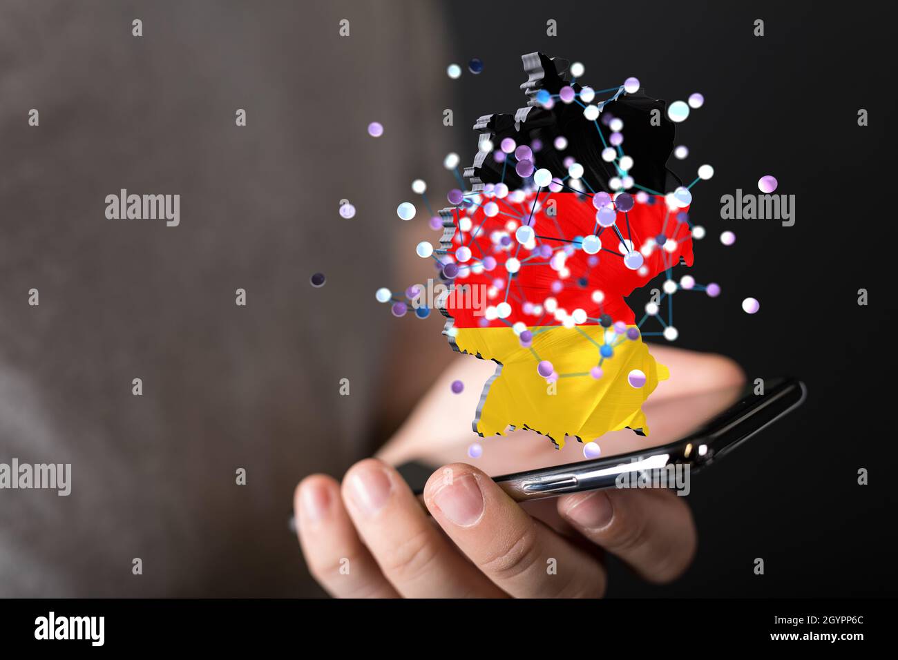 3D rendering of digital Germany map floating on human hand with phone ...